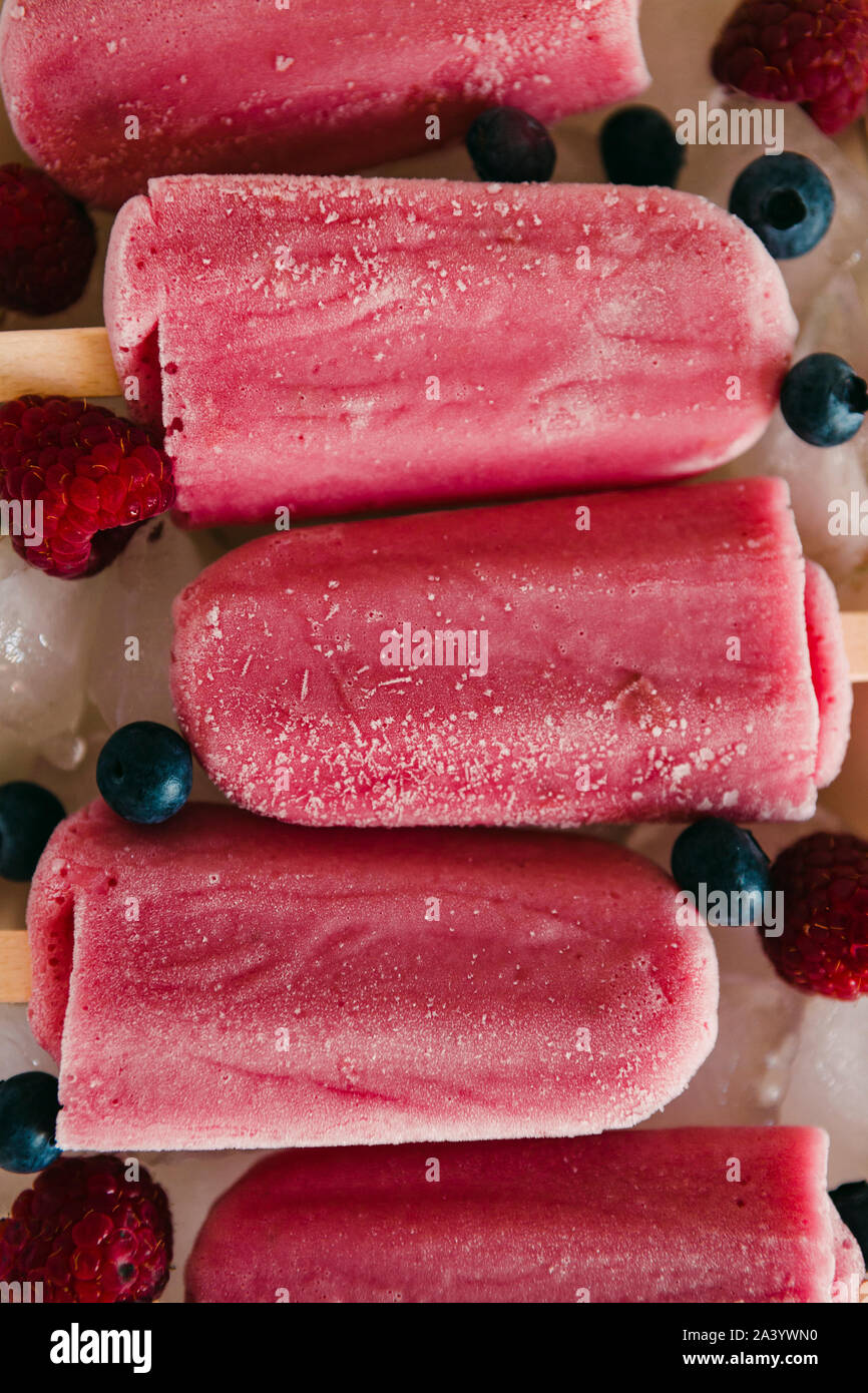Berry ice pops with berries Stock Photo - Alamy