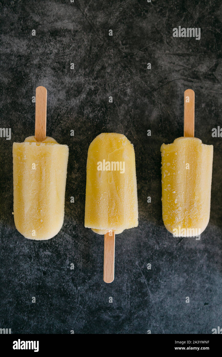 Row of lemon ice pops Stock Photo - Alamy