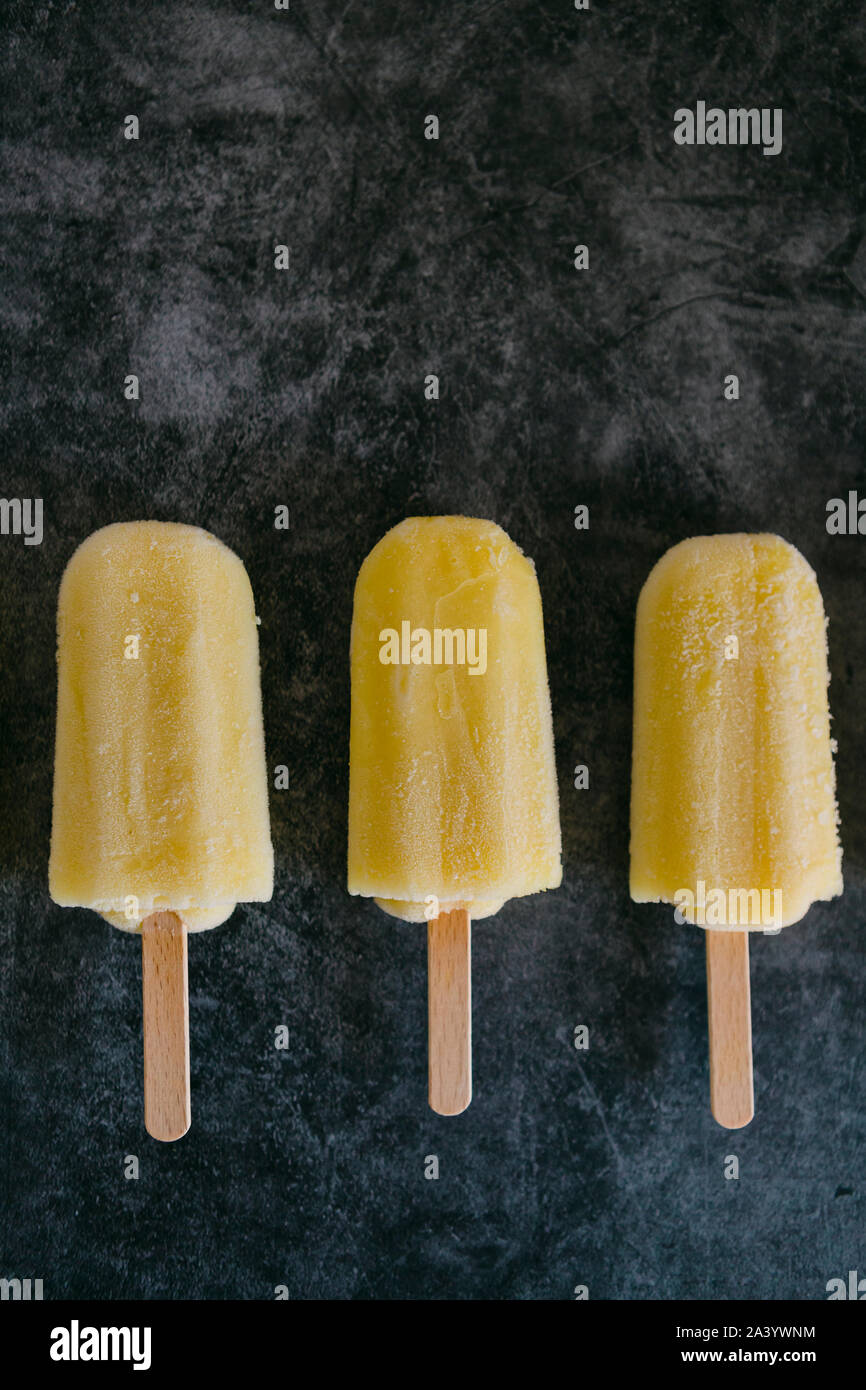 Row of lemon ice pops Stock Photo - Alamy