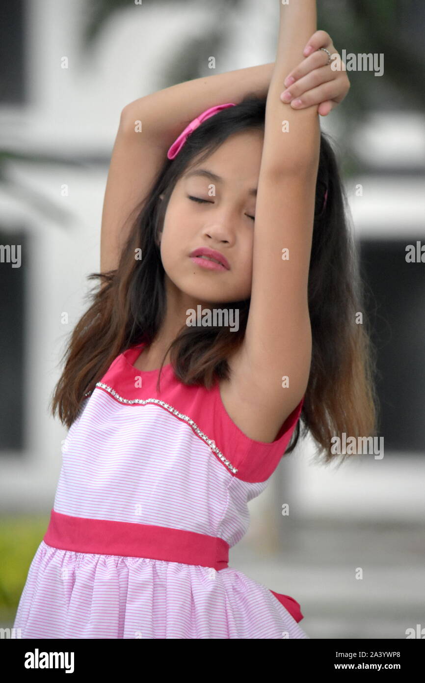 Stretching Youthful Filipina Girl Stock Photo - Alamy