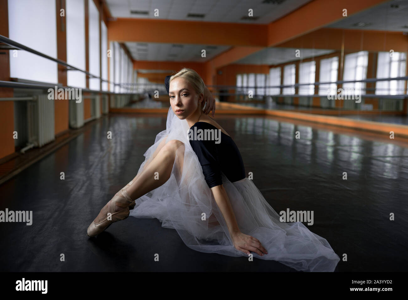 Young woman in leotard sitting hi-res stock photography and images - Alamy