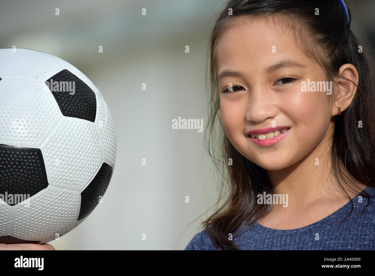 An Athlete Female Soccer Player Smiling Stock Photo - Alamy