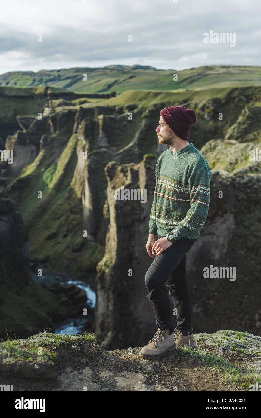 Man standing on cliff above hi-res stock photography and images - Alamy
