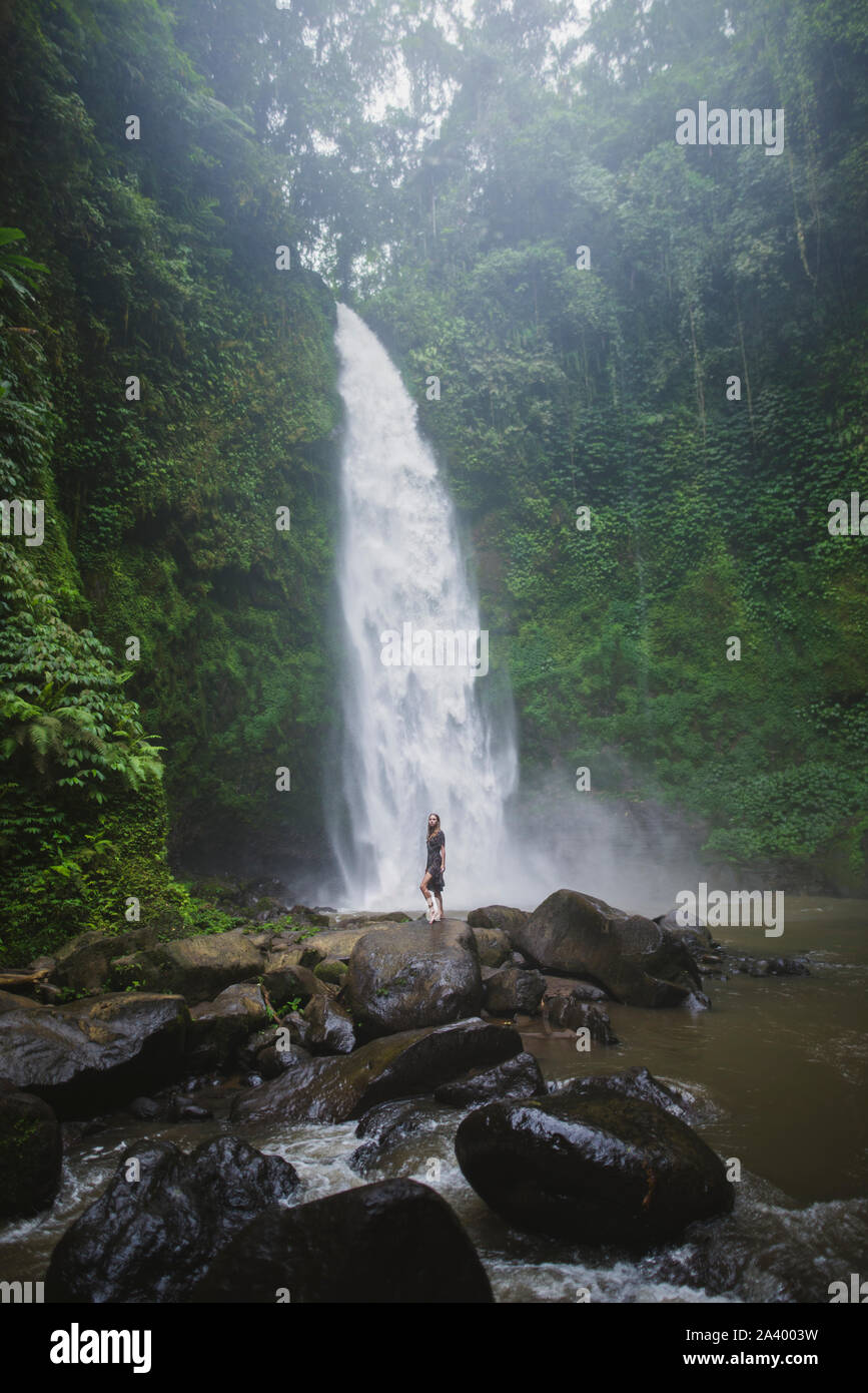 Woman cliff indonesia hi-res stock photography and images - Alamy
