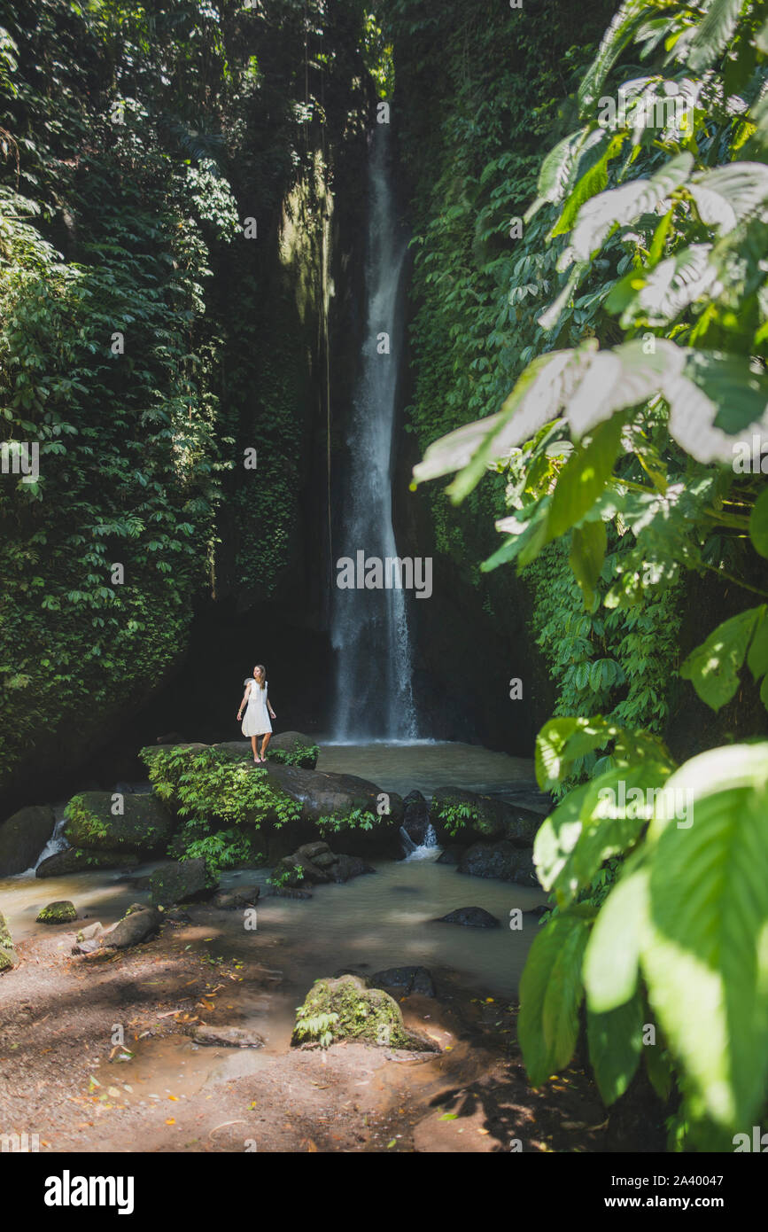 Woman cliff indonesia hi-res stock photography and images - Alamy