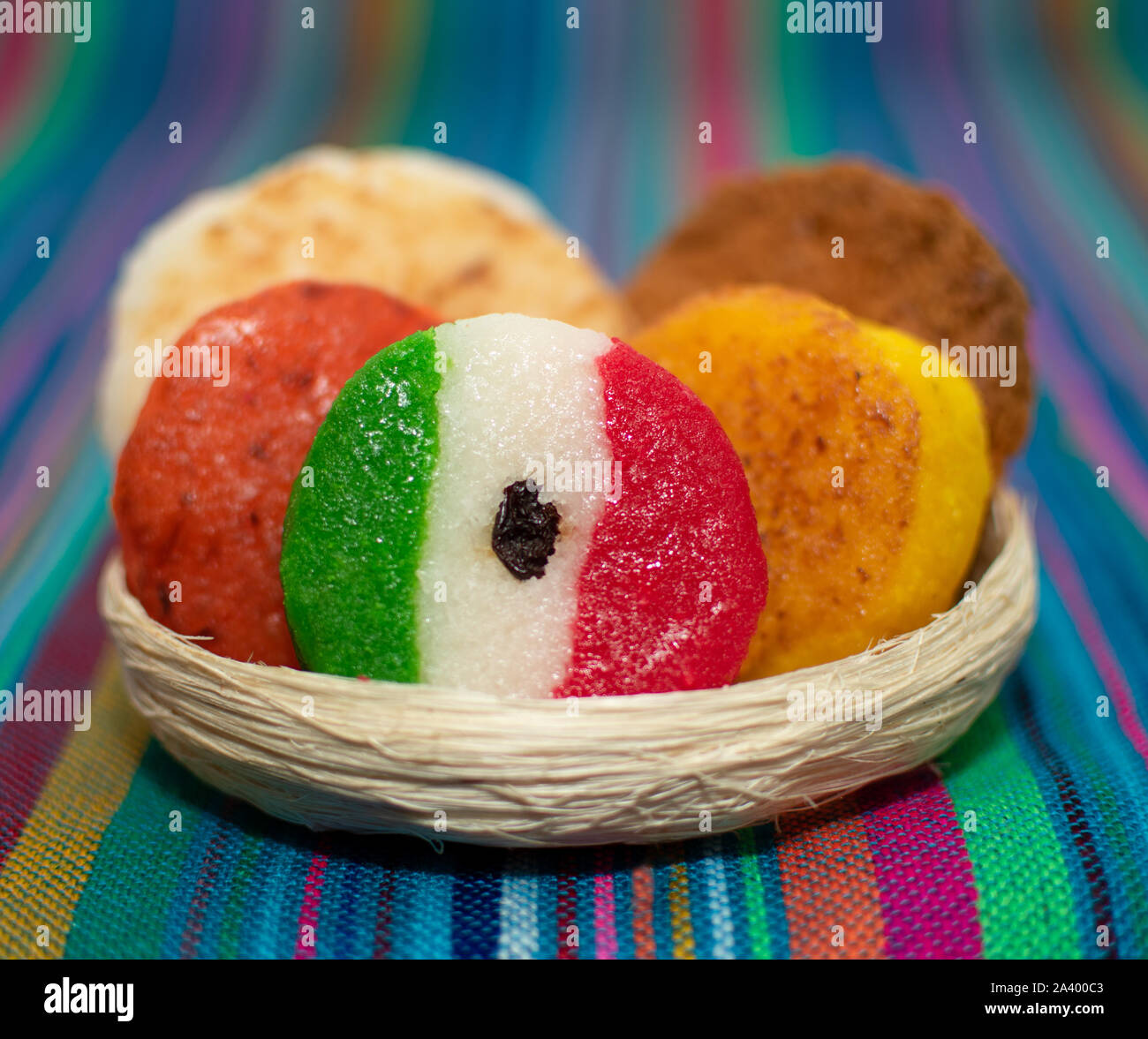 basket with a bunch of typical mexican coconut candies honey cocada ...