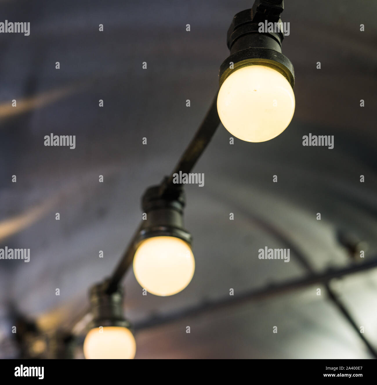 Vintage antique hanging light bulbs at a street food market Stock Photo ...