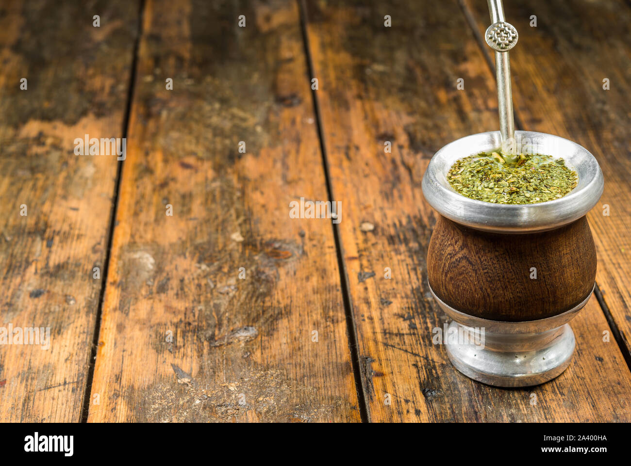 Traditional Argentinian yerba mate tea in a calabash gourd with ...