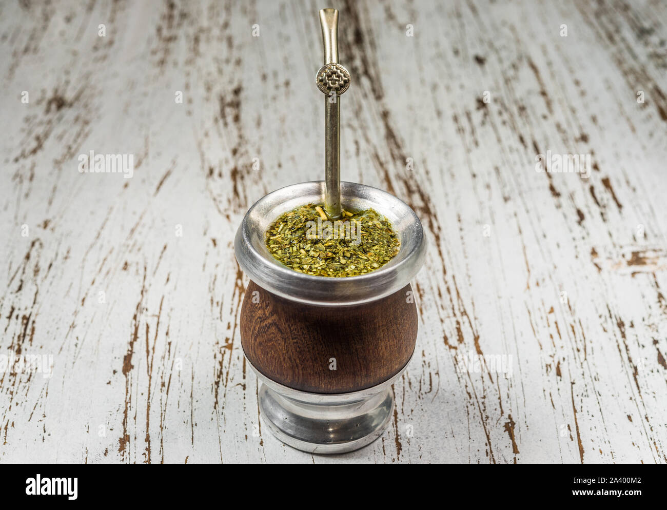 Traditional Argentinian yerba mate tea in a calabash gourd with ...