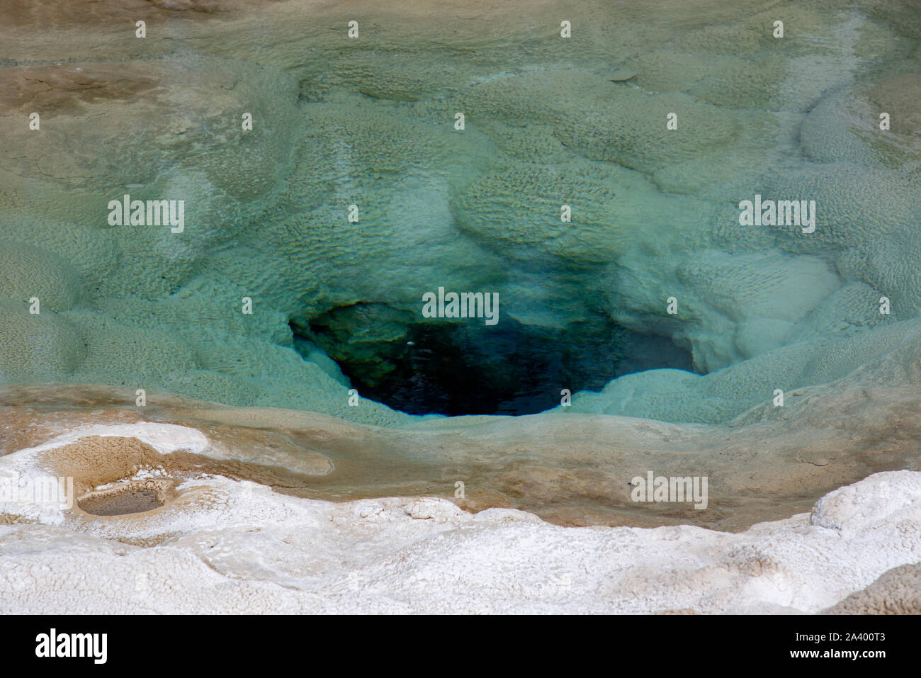 blue and white hot spring in yellowstone national park Stock Photo - Alamy