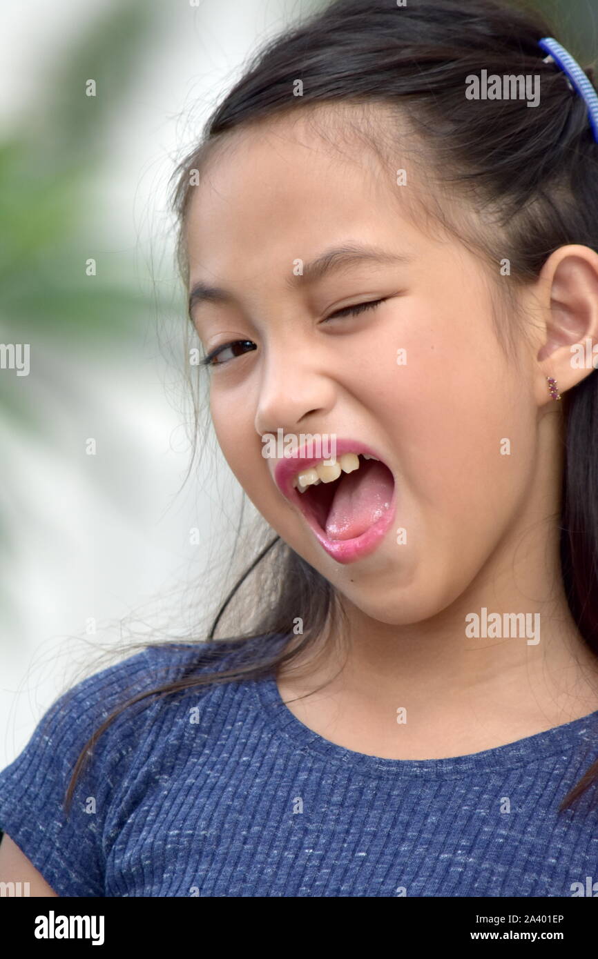 An Asian Female Making Funny Faces Stock Photo - Alamy