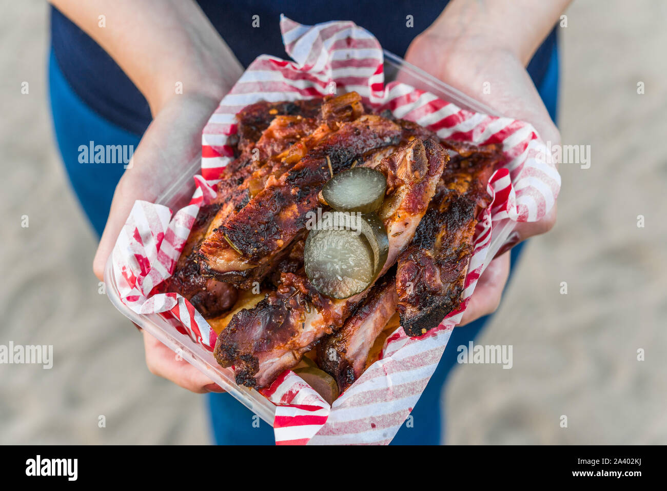 Pork barbecue baby ribs at a street food market Stock Photo - Alamy
