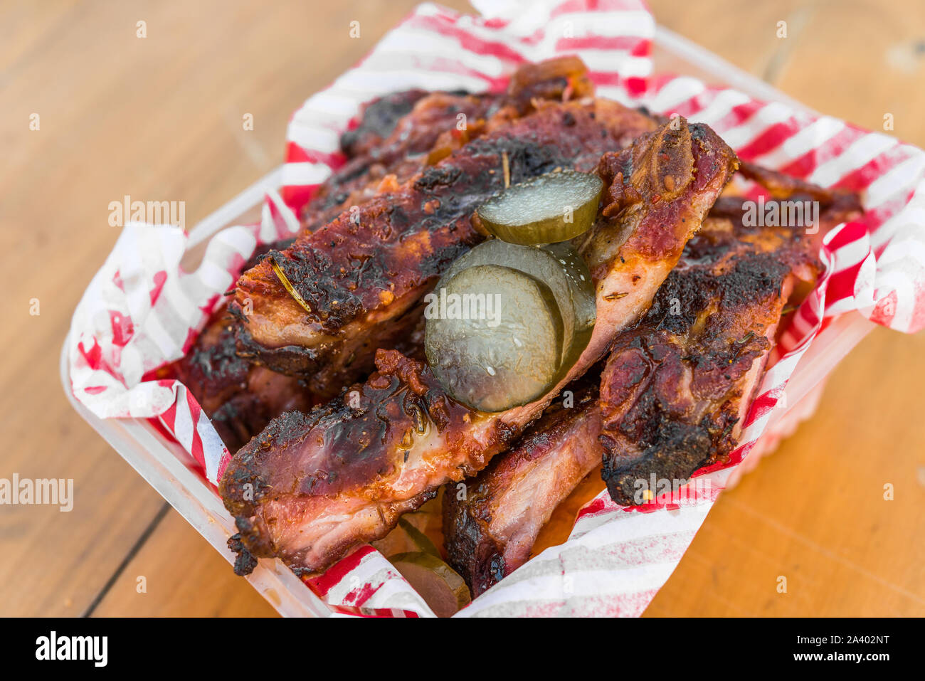 Pork barbecue baby ribs at a street food market Stock Photo - Alamy