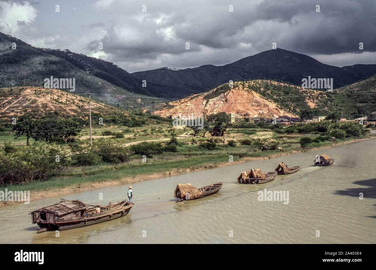 Shenzhen, Guangdong, China. 3rd Aug, 1981. A sampan with outboard motor ...