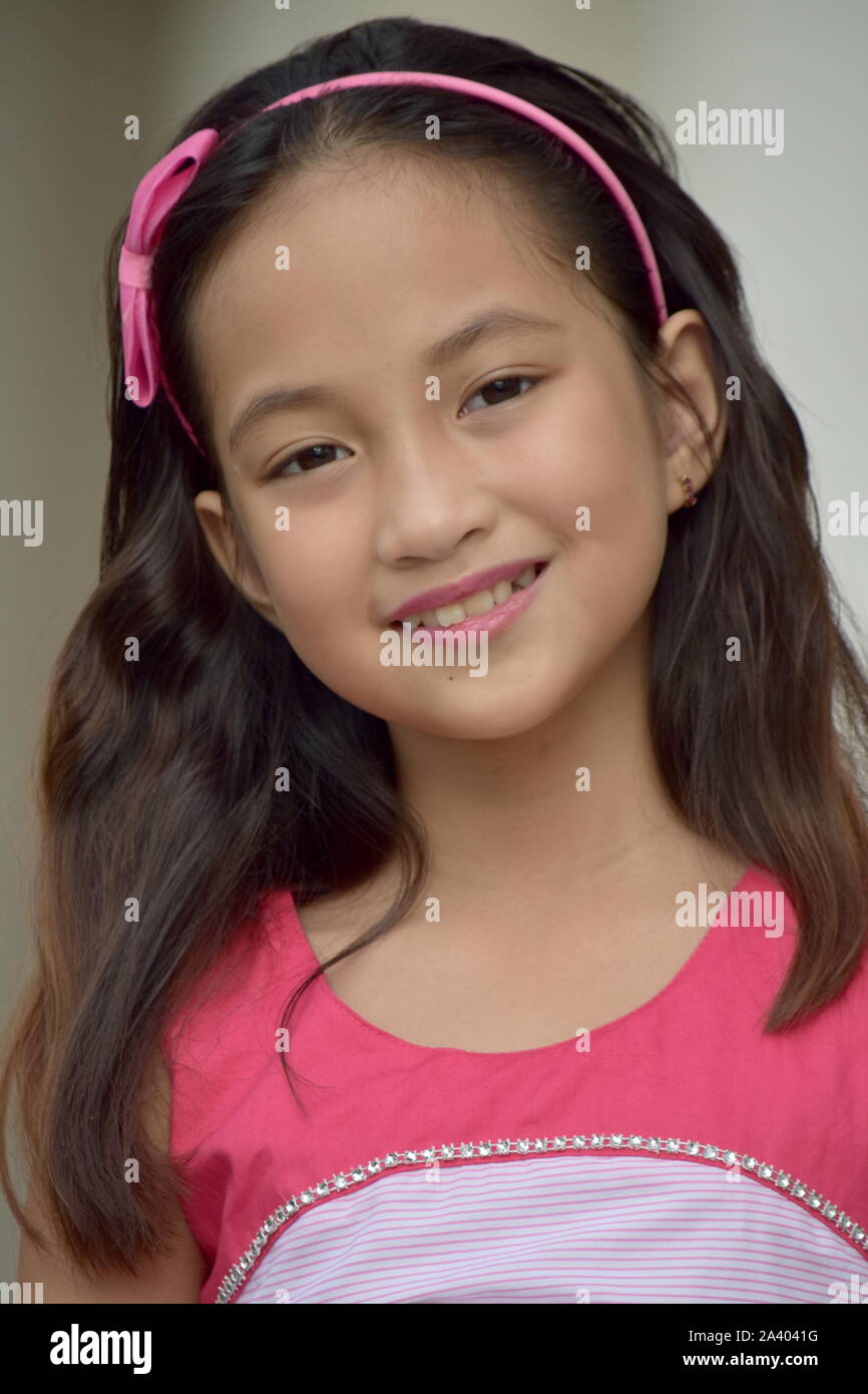 Cute Filipina Girl Smiling Stock Photo - Alamy