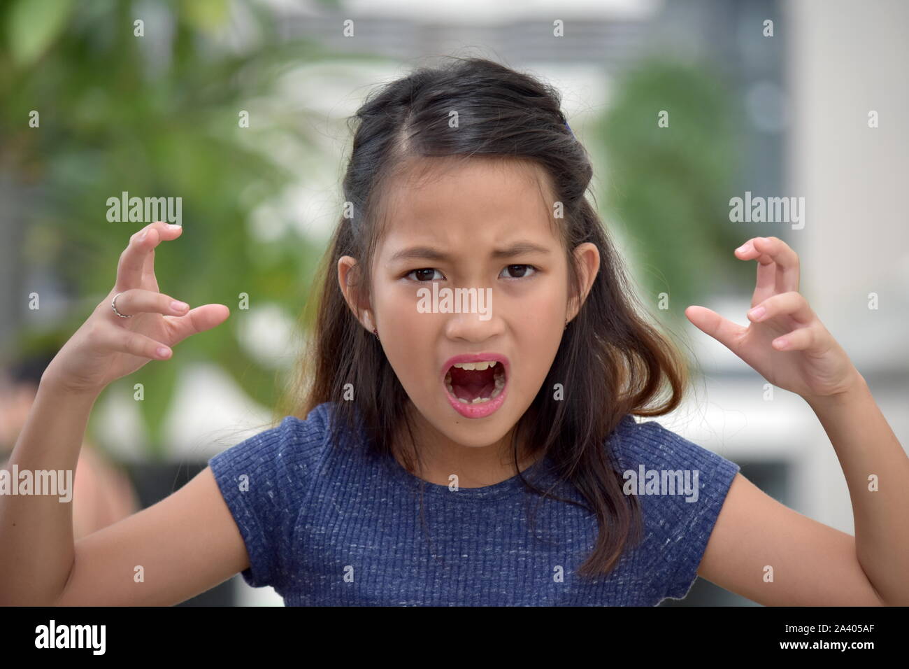 Angry tween hi-res stock photography and images - Alamy