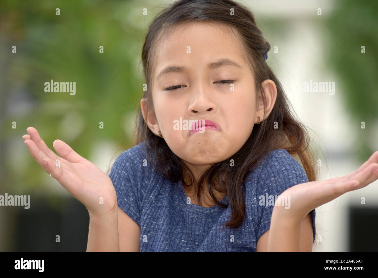 Girl And Indecisiveness Stock Photo - Alamy