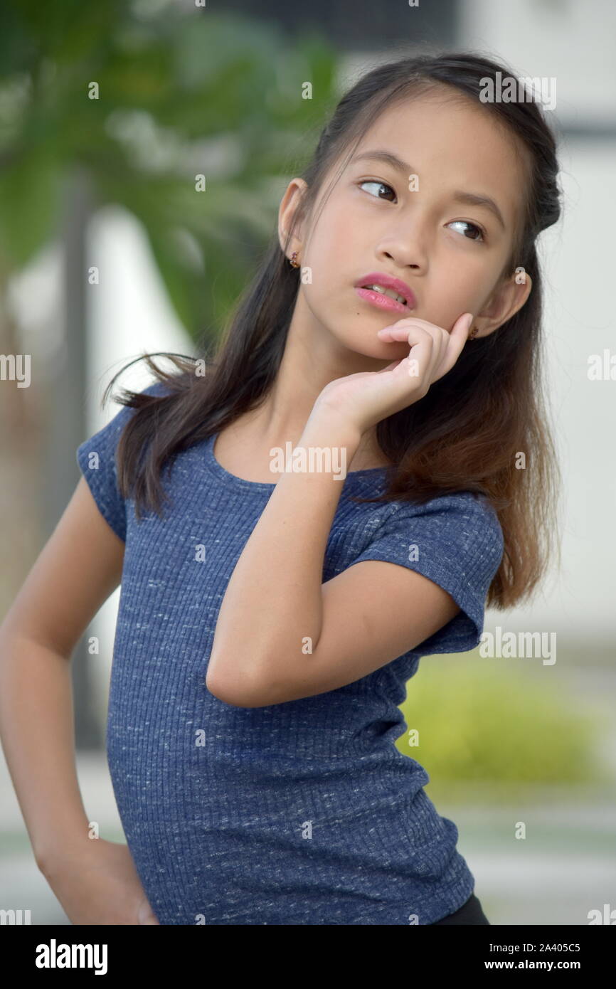 Thoughtful Asian Person Stock Photo - Alamy