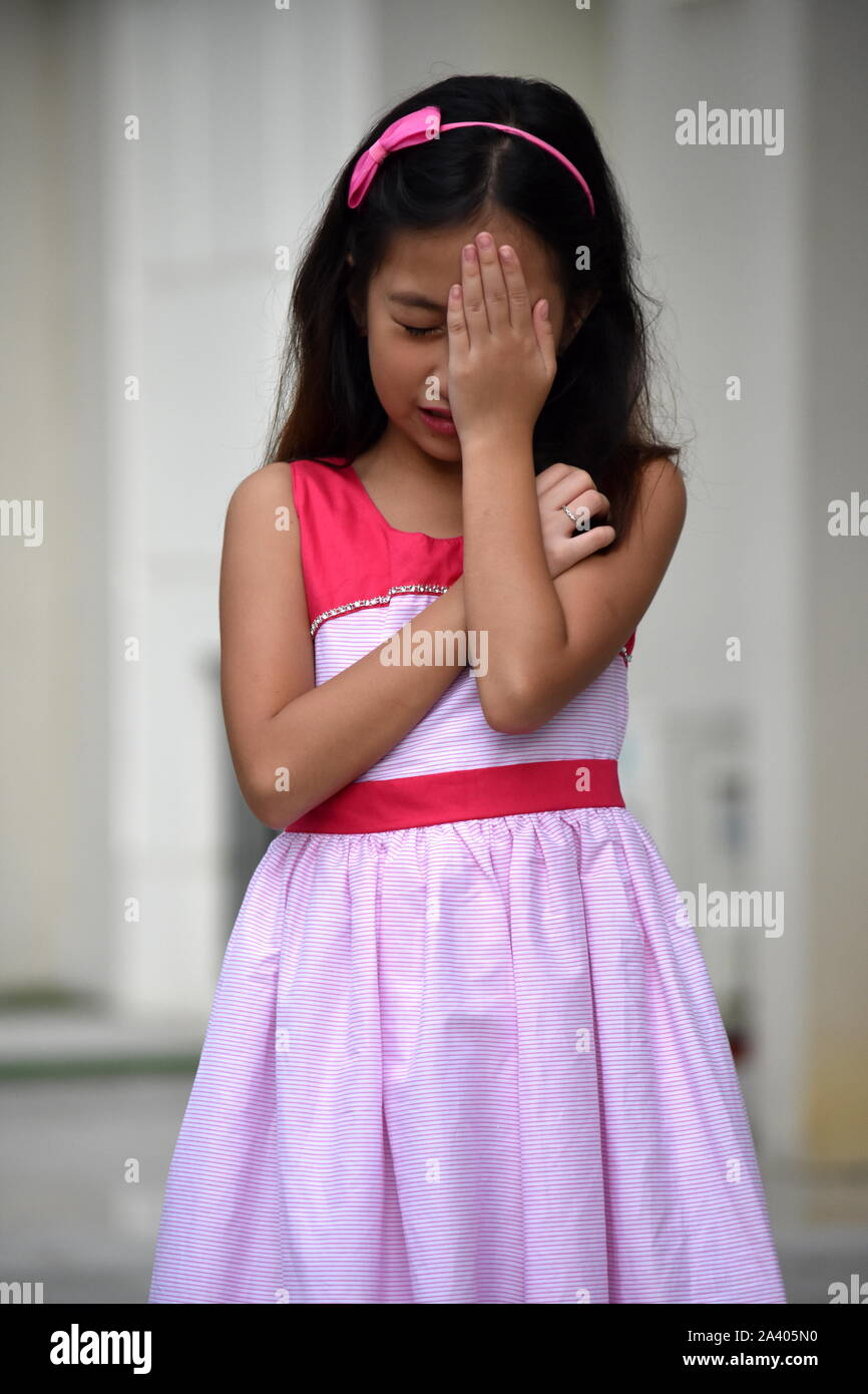 Asian Teen Girl And Sadness Wearing Dress Stock Photo - Alamy
