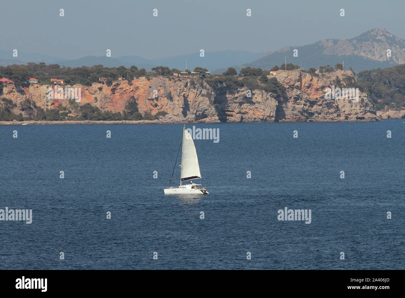 Sailing-motor yacht running along coast. Toulon, France Stock Photo - Alamy