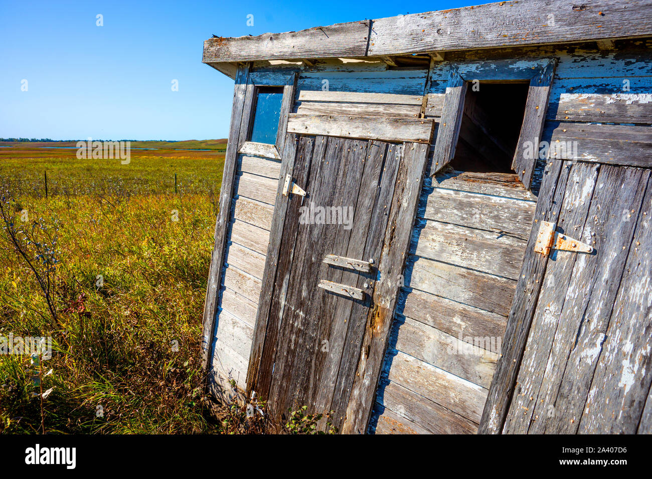 One-room country school outhouse on the North Dakota prairie in late ...