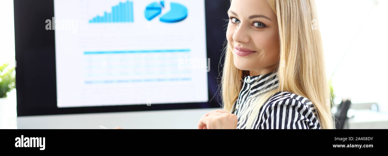 Beautiful smiling clerk looking in camera portrait Stock Photo - Alamy