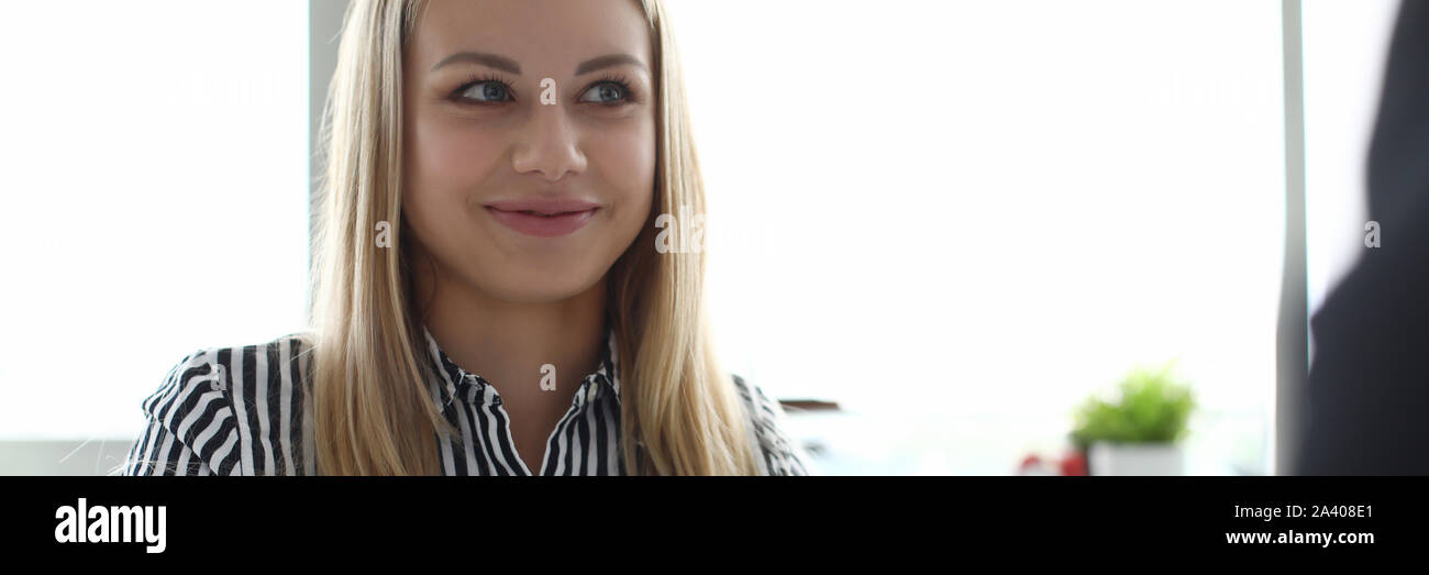 Pretty female colleague Stock Photo - Alamy