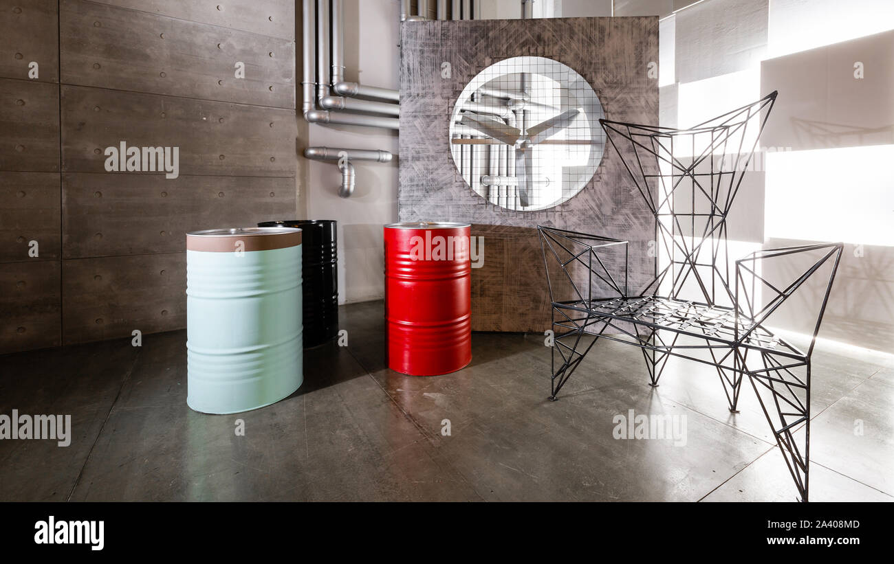 Interior photo Studio. modern metal chair and concrete wall Stock Photo ...