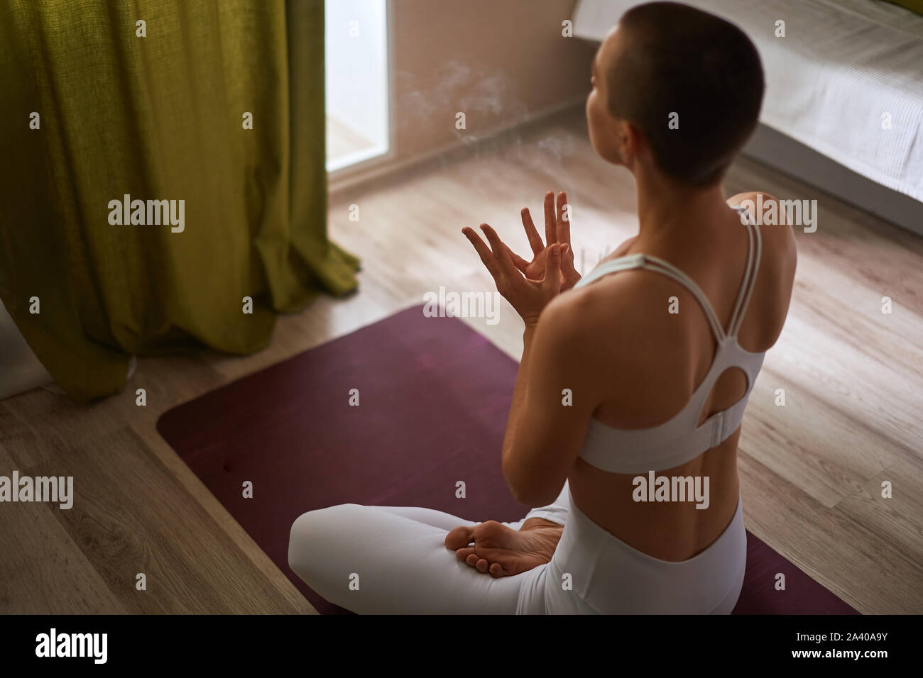 Attractive girl practicing yoga hi-res stock photography and images - Alamy