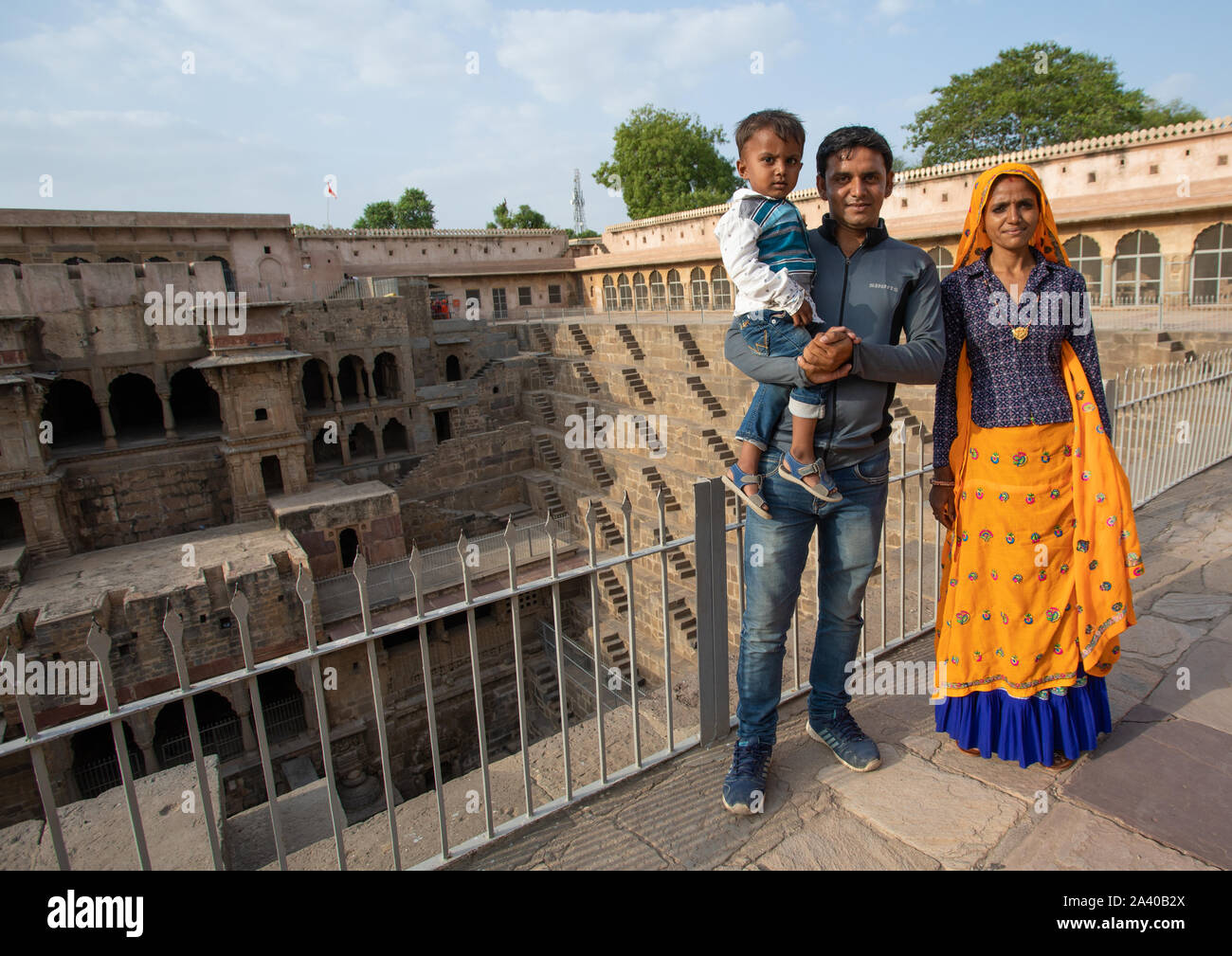 Rajasthani family in Chand Baori stepwell, Rajasthan, Abhaneri, India ...