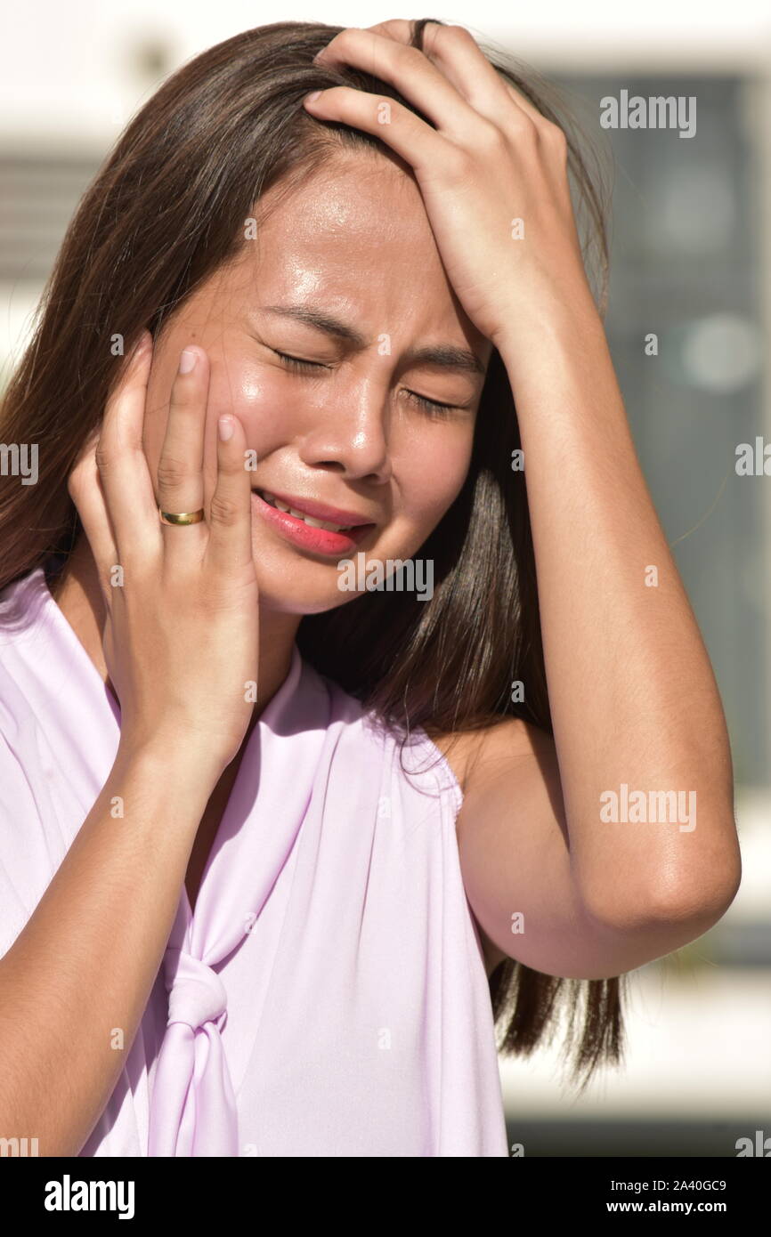 Young Adult Female And Anxiety Stock Photo - Alamy