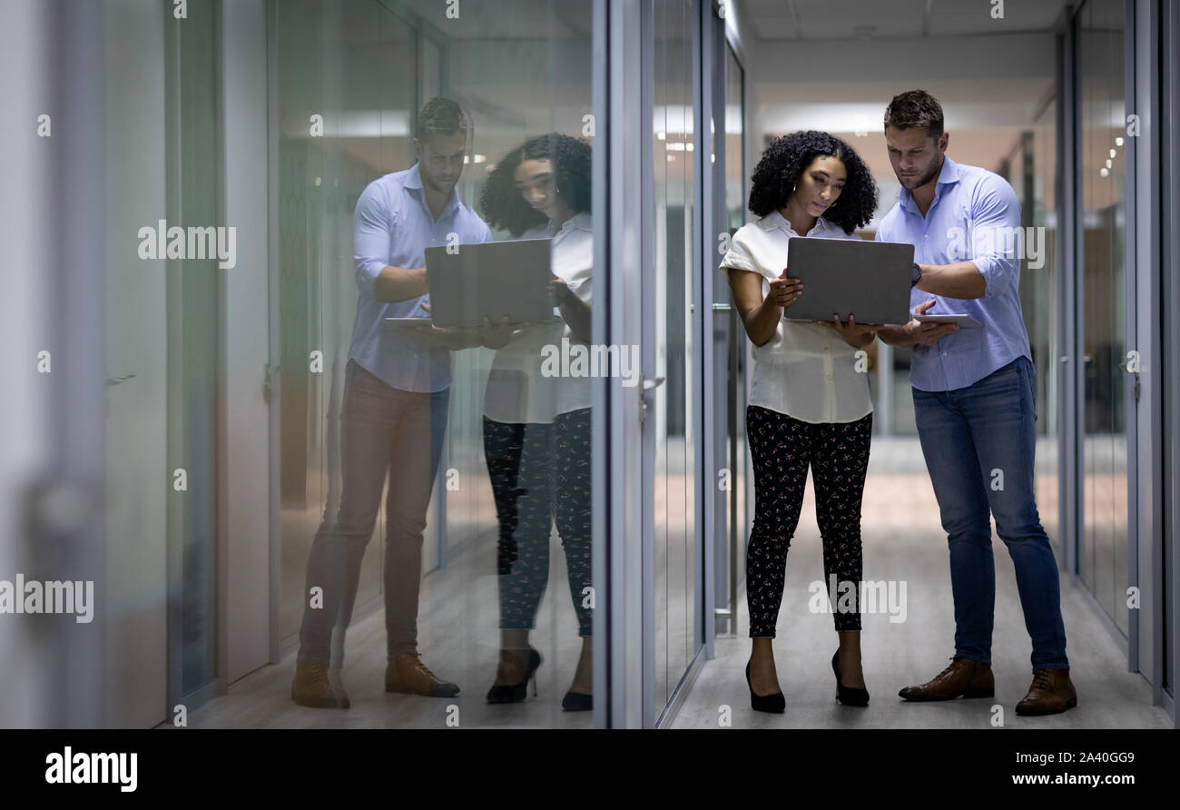 Two professionals standing together in hi-res stock photography and ...