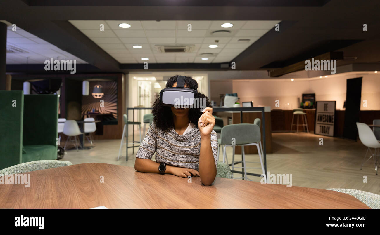 Female using augmented reality video hi-res stock photography and ...