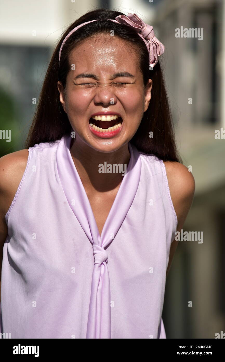 An Upset Asian Female Stock Photo - Alamy