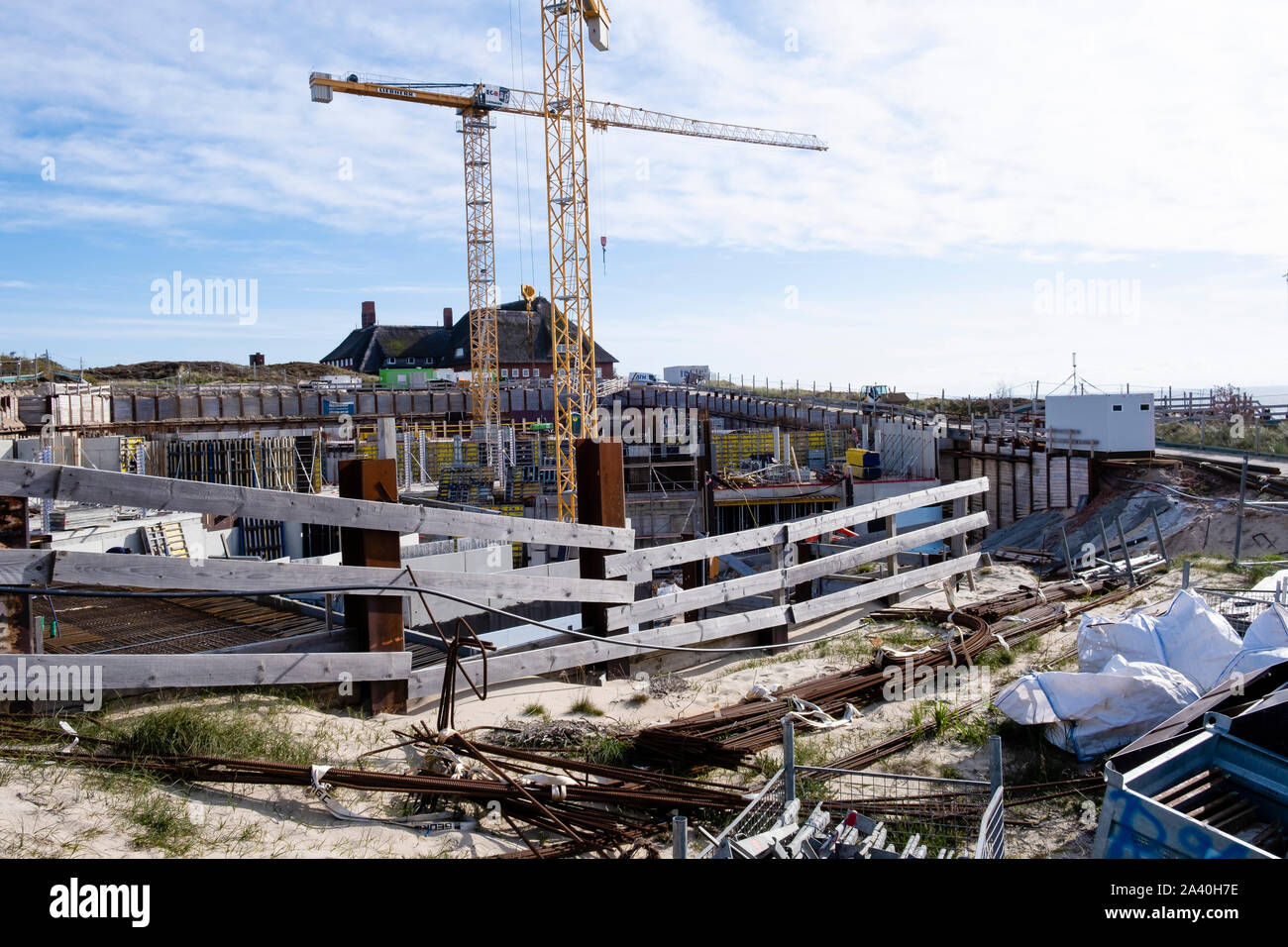 Westerland, Germany. 07th Oct, 2019. Cranes stand in an excavation pit ...
