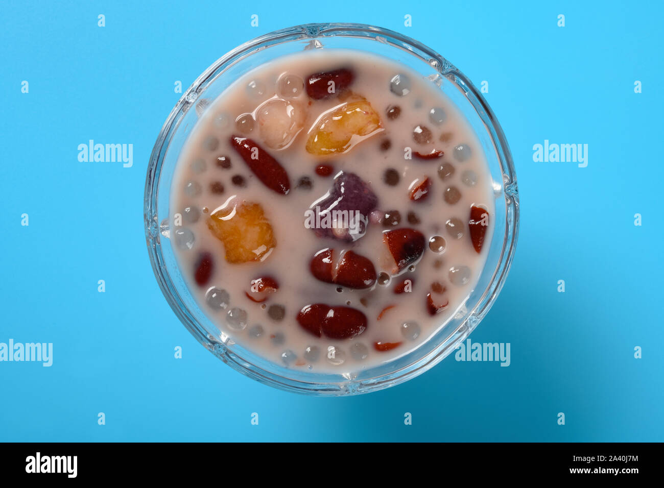 top view Chinese syrup of red bean and sago with shredded coconut on ...