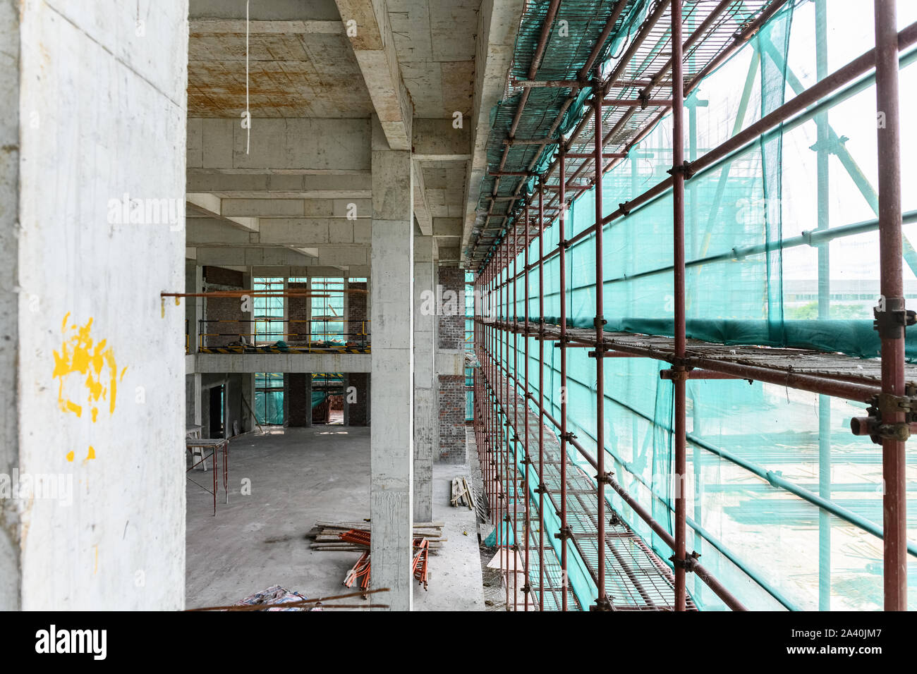 inside of an unfinished building with protection scaffolding and ...
