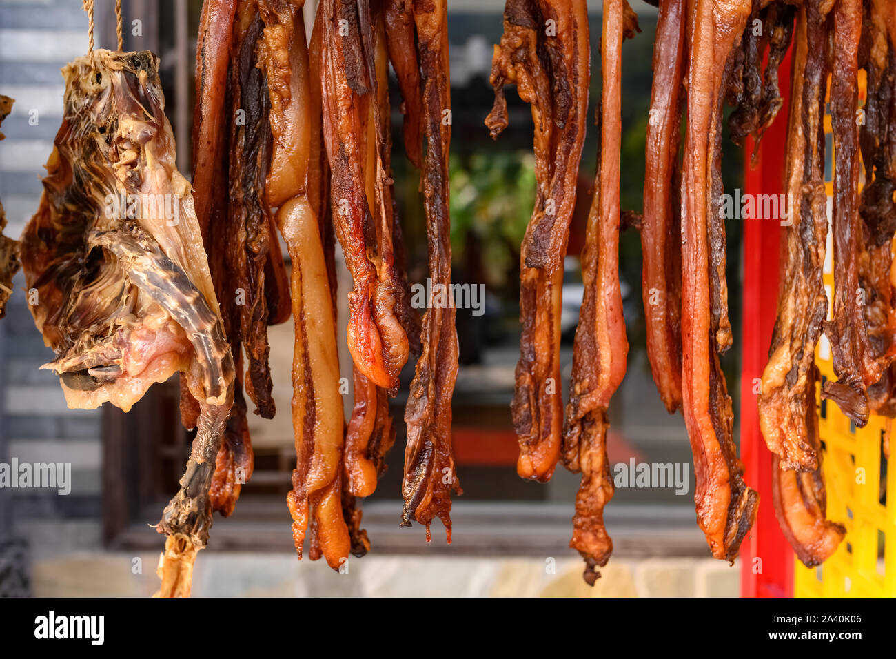 air-dried bacon and duck hanging on shelf Stock Photo - Alamy