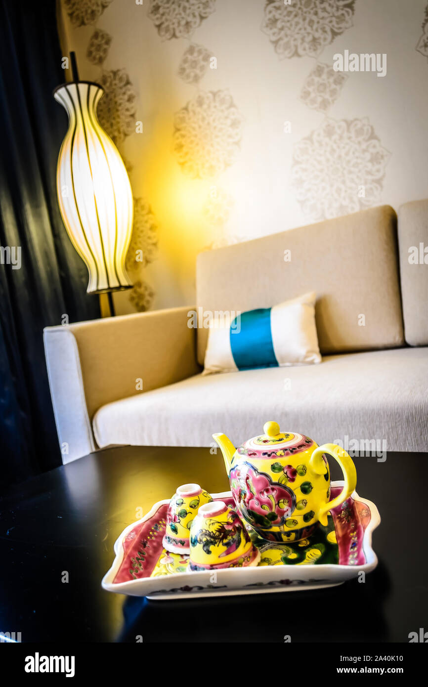 peranakan tea set on a tray on a coffee table in a living room Stock ...