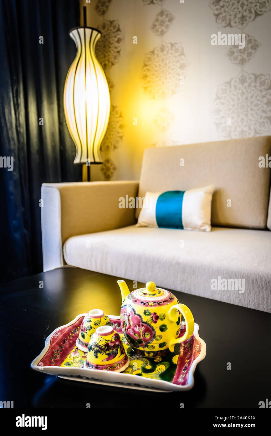 peranakan tea set on a tray on a coffee table in a living room Stock ...