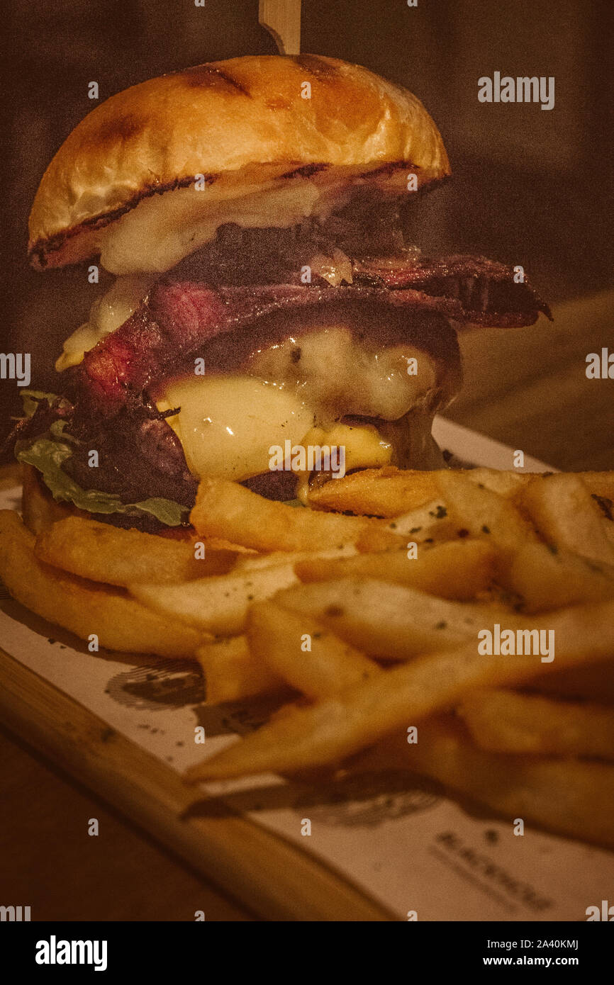 Freshly ground 130gm beef patty, monterey jack cheese, beef bacon ...