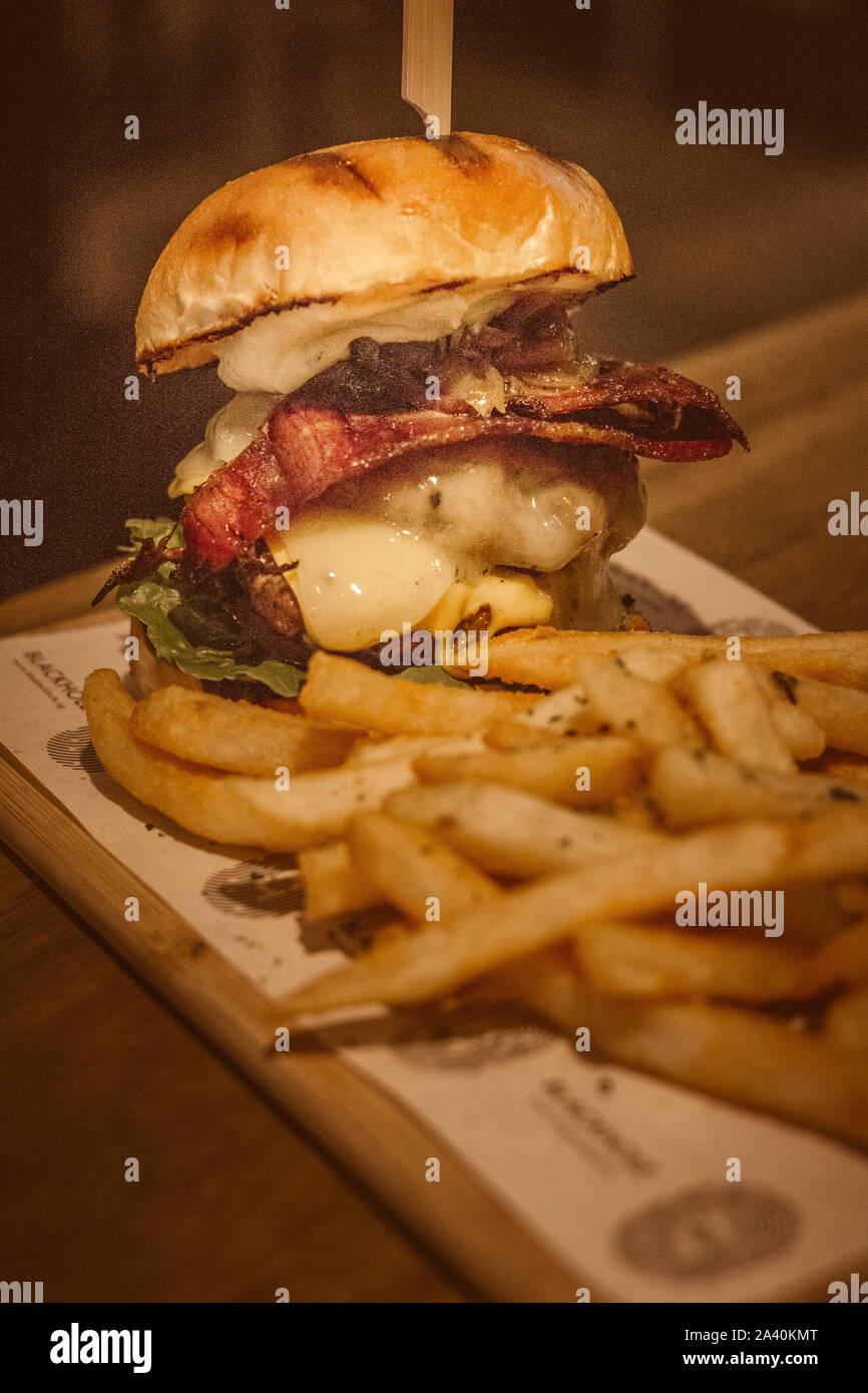 Freshly ground 130gm beef patty, monterey jack cheese, beef bacon ...