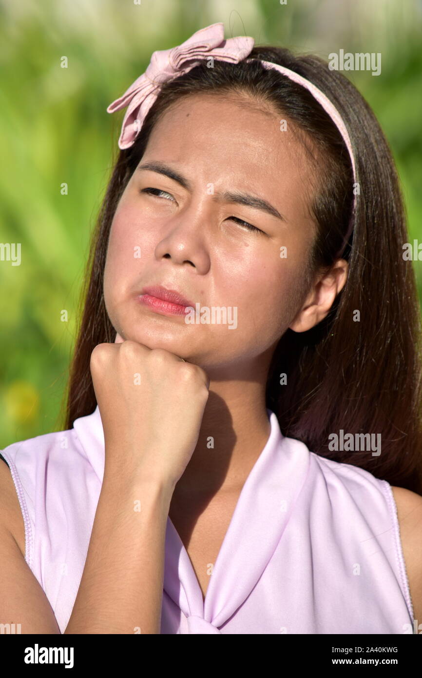 An Adult Female Making A Decision Stock Photo - Alamy