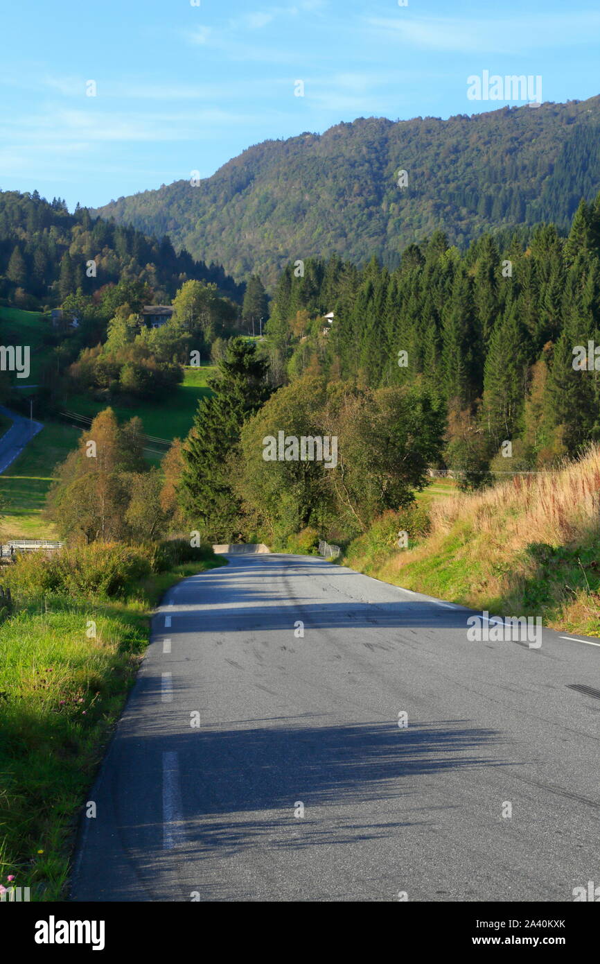 A tarred country road runs through the rural landscape on the island of ...