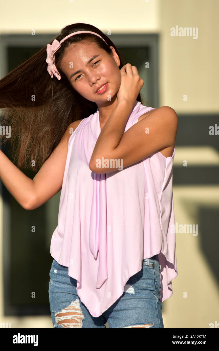 Young Asian Female Posing Stock Photo - Alamy