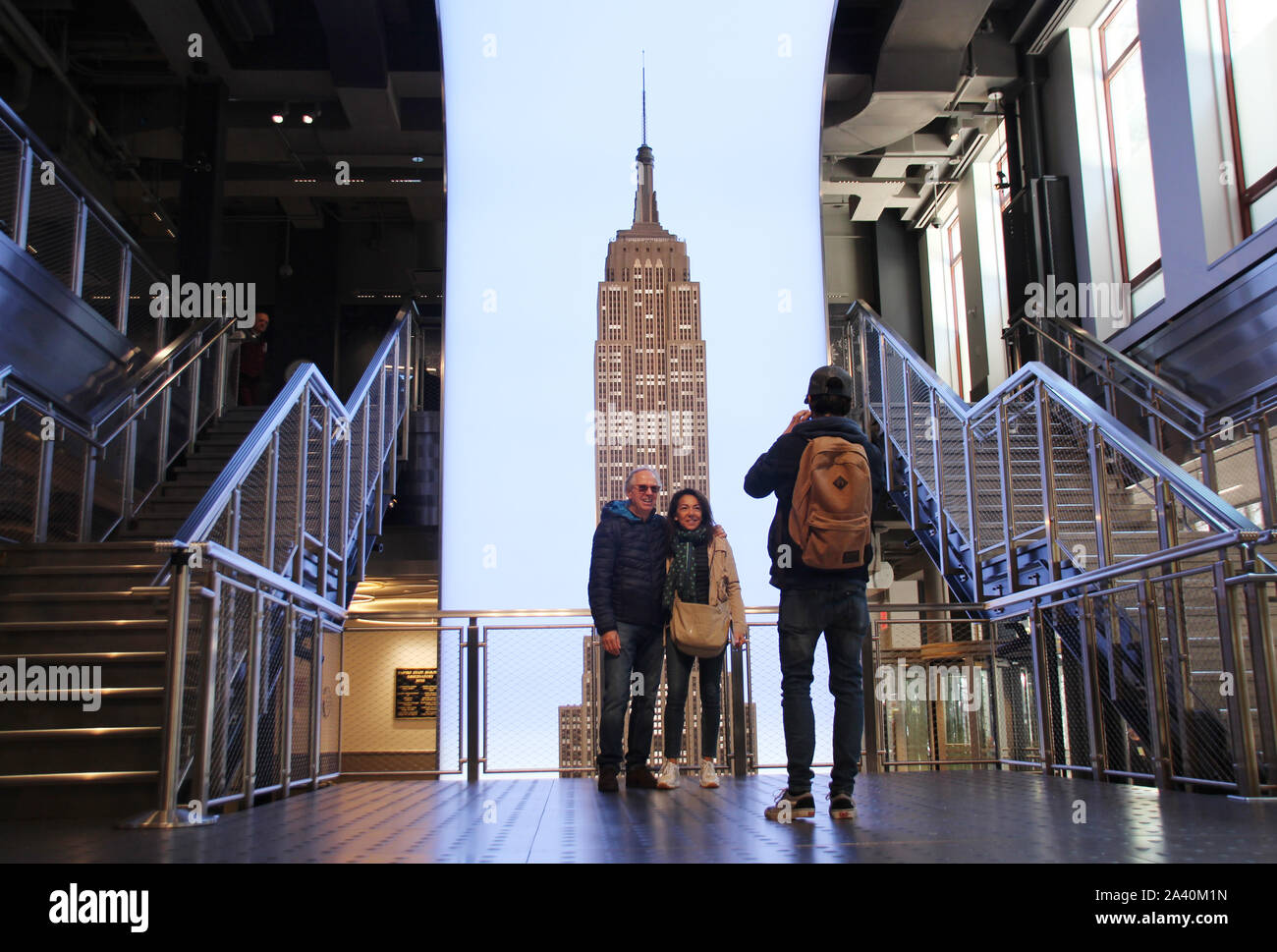 New York, USA. 10th Oct, 2019. Visitors photograph themselves in front ...