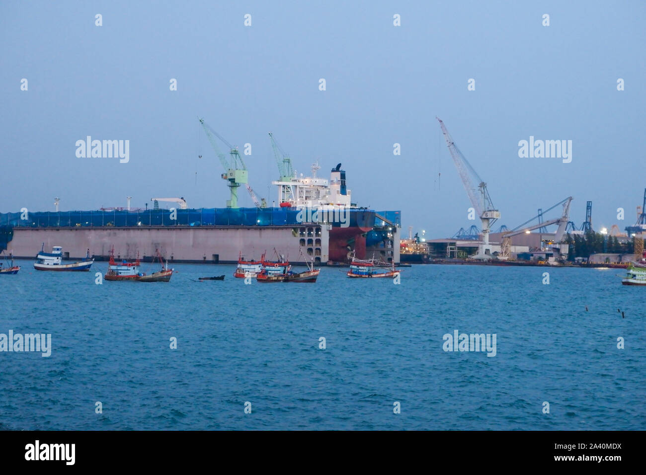 View of the shipyard, shipyard, crane, gantry and cargo ship parked in ...