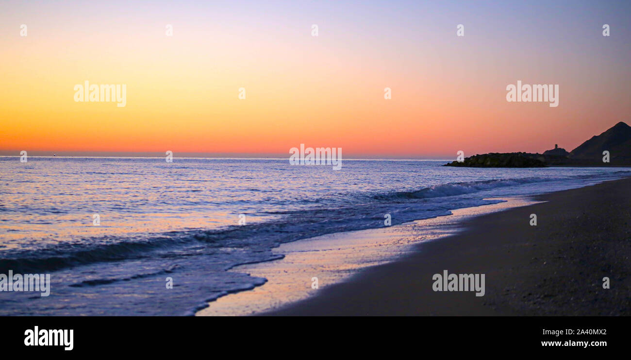 A Spanish Sun Rise at The Beach Stock Photo - Alamy