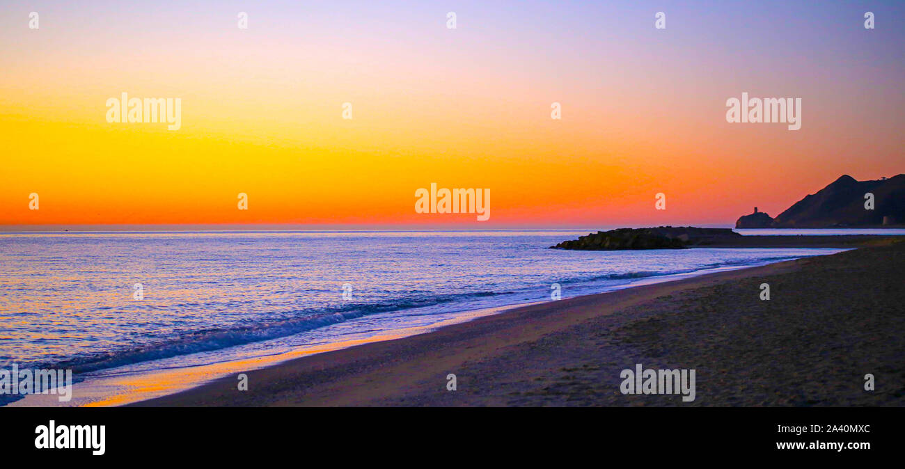 A Spanish Sun Rise at The Beach Stock Photo - Alamy