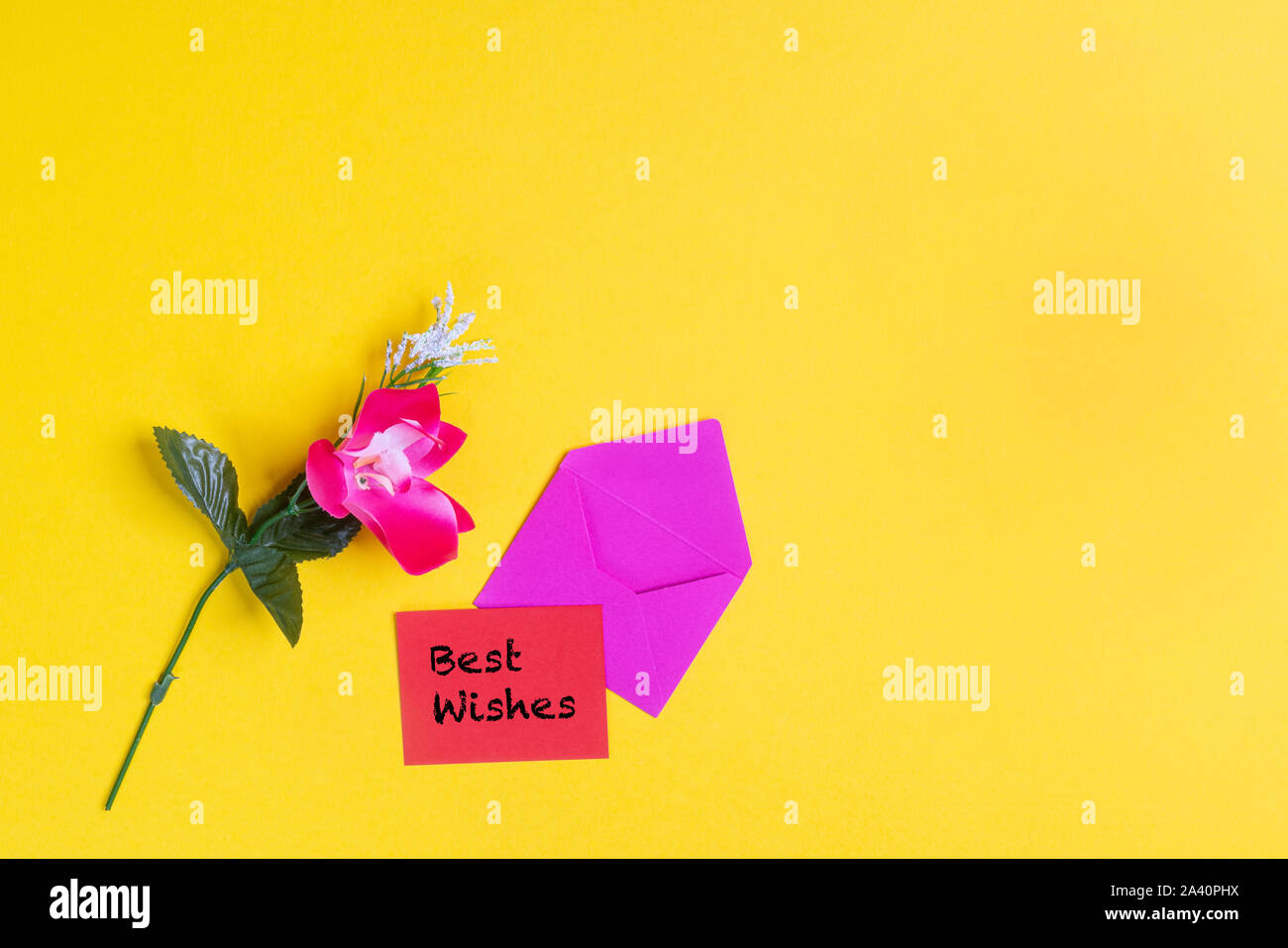 Small wishes cards on a colored background Stock Photo - Alamy